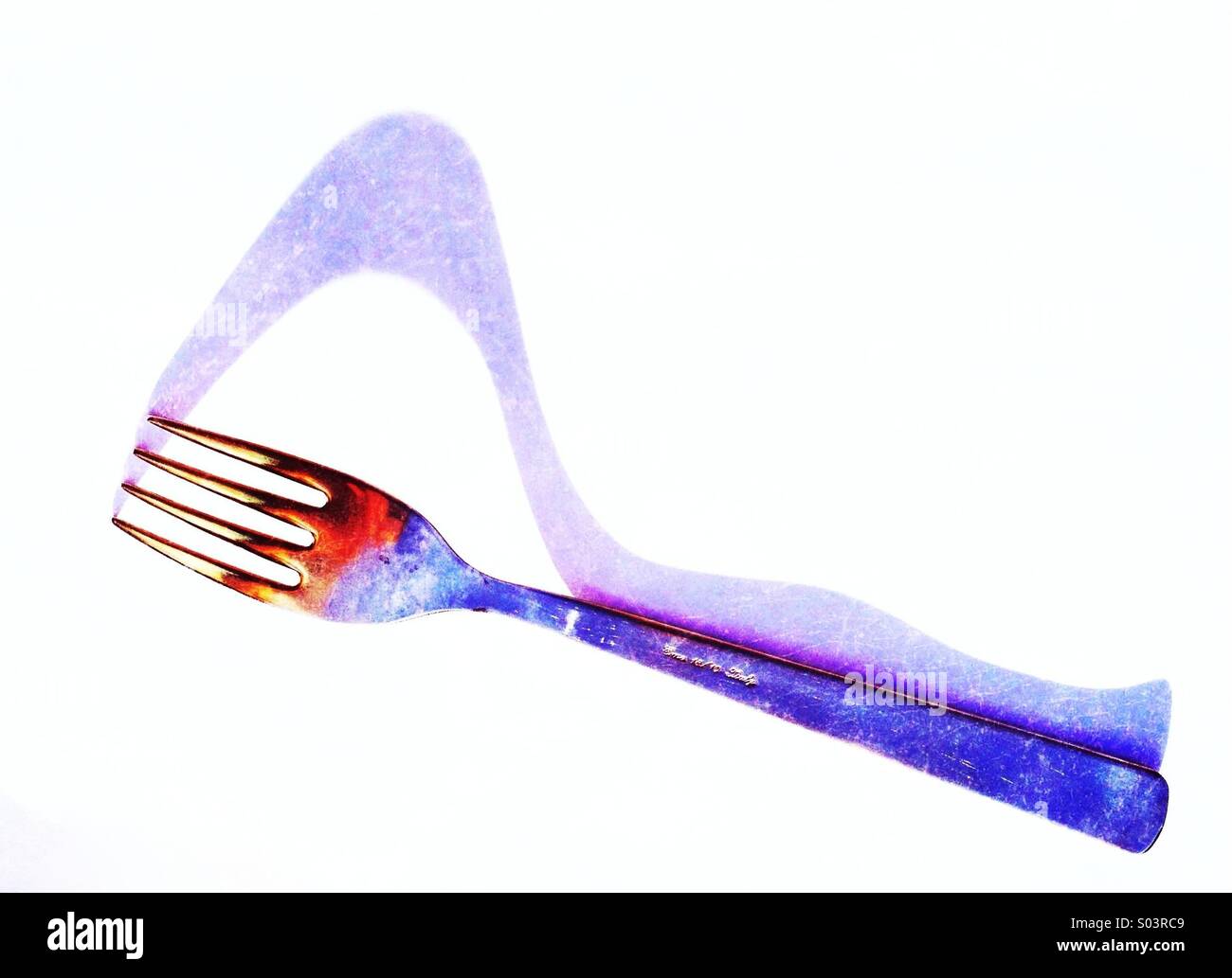 Fork casting shadow Stock Photo - Alamy