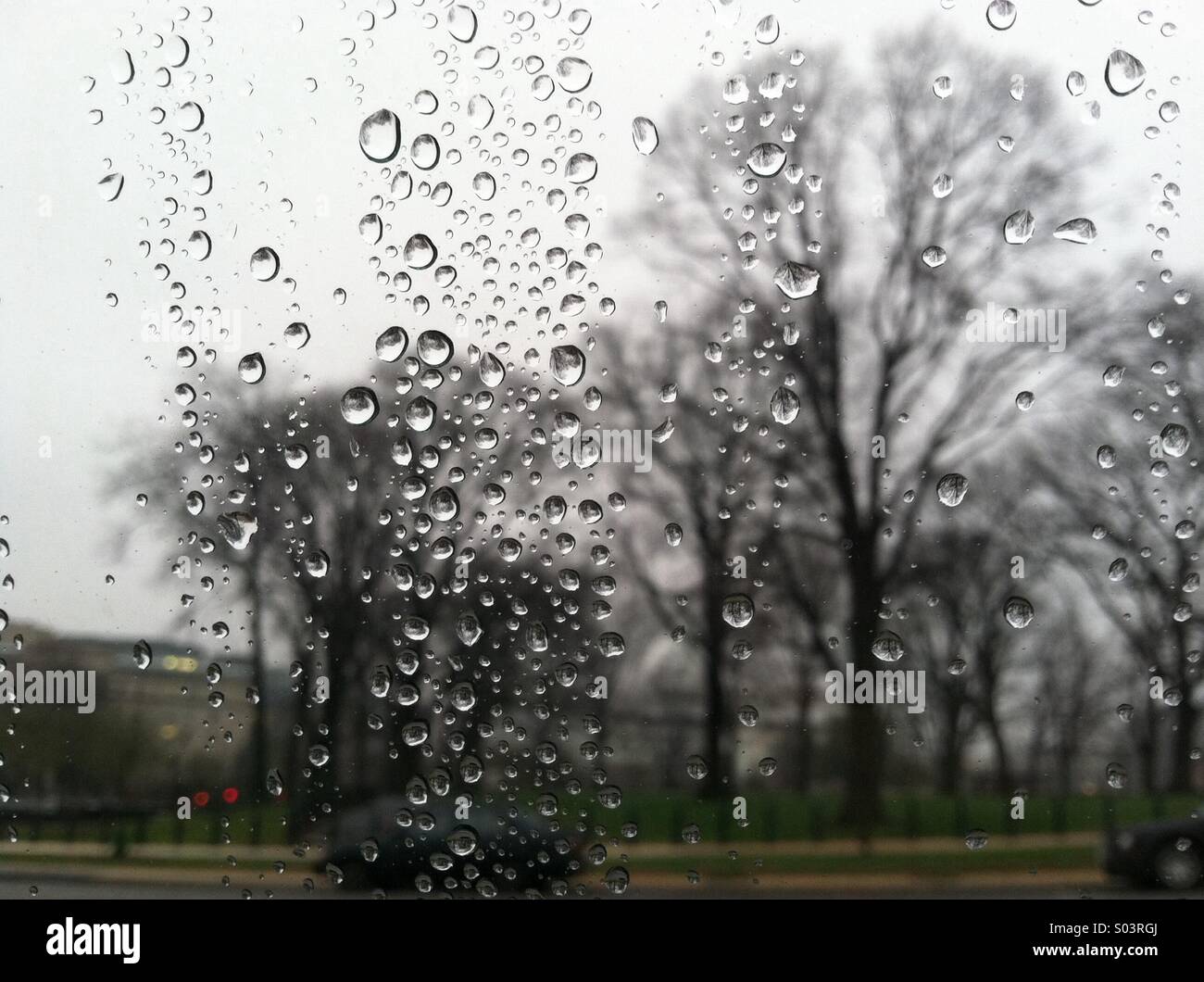 Rain on car window Stock Photo - Alamy