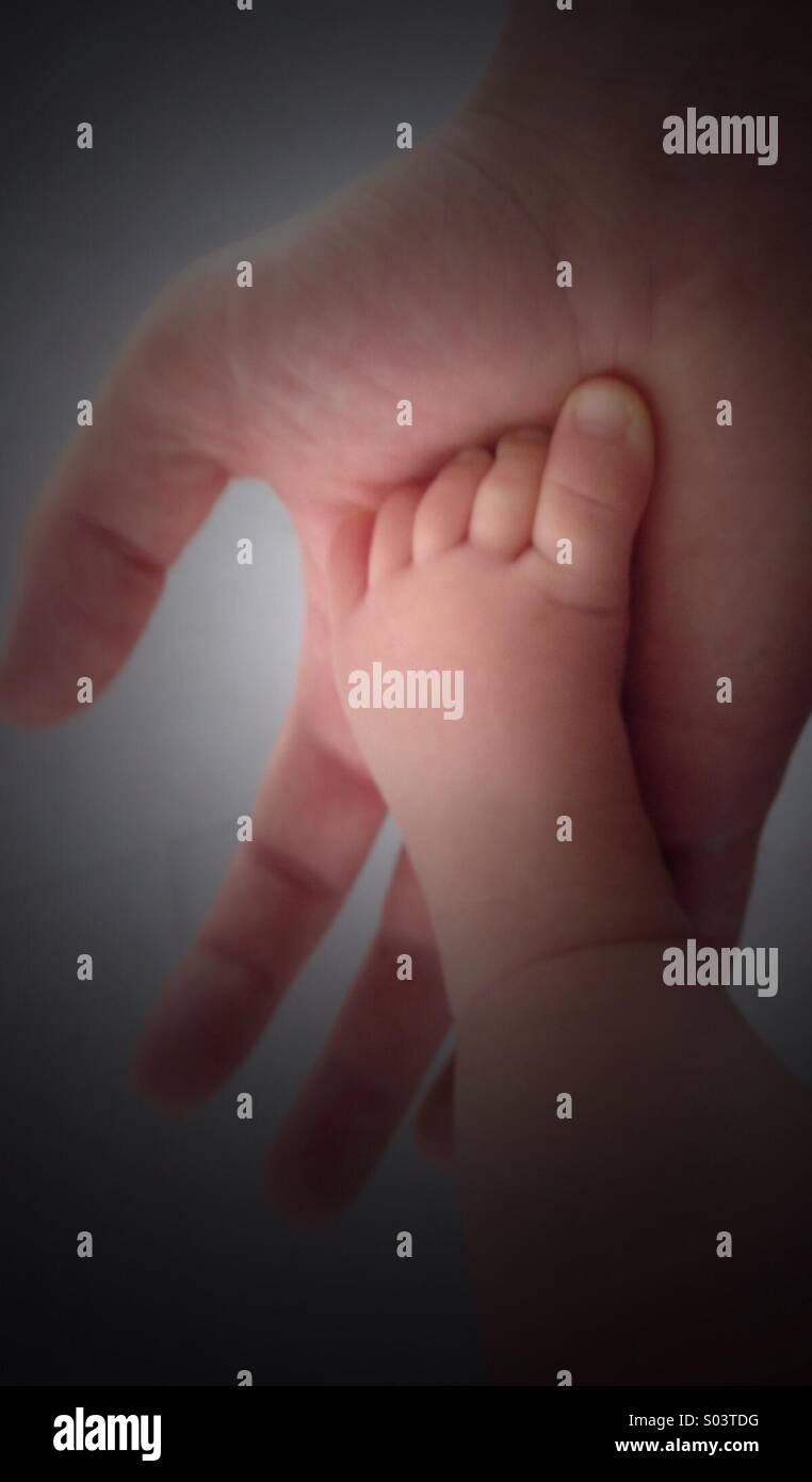 Baby foot hand hi-res stock photography and images - Alamy