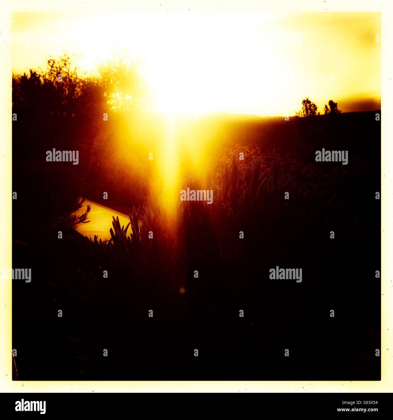 sunrise over landscape Stock Photo - Alamy