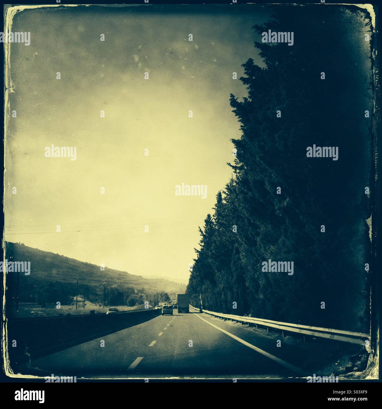 A road whilst driving Stock Photo - Alamy