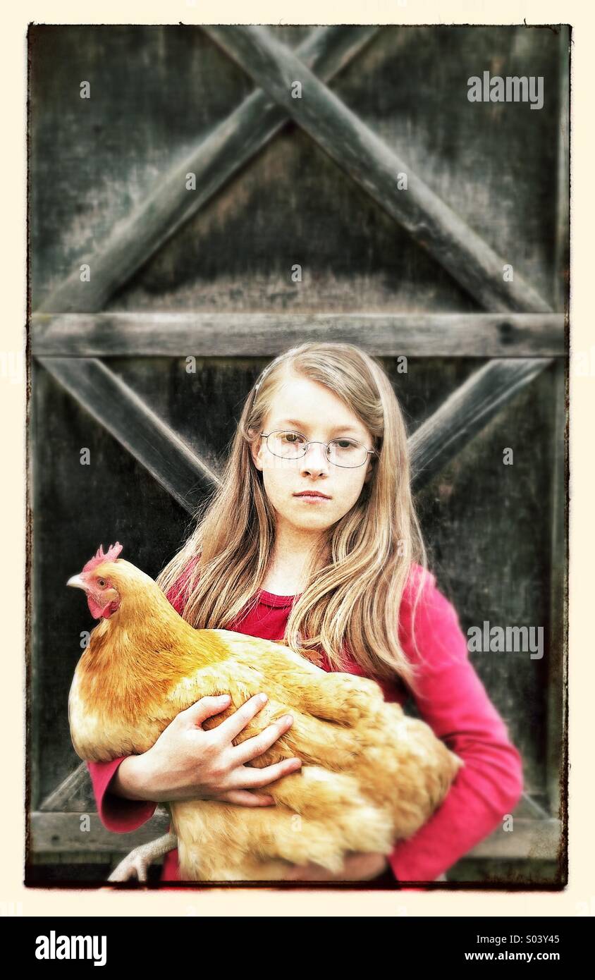 Girl and chicken hi-res stock photography and images - Alamy