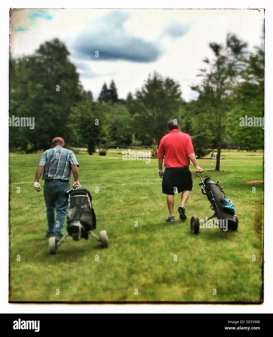 Guys golf hi-res stock photography and images - Alamy