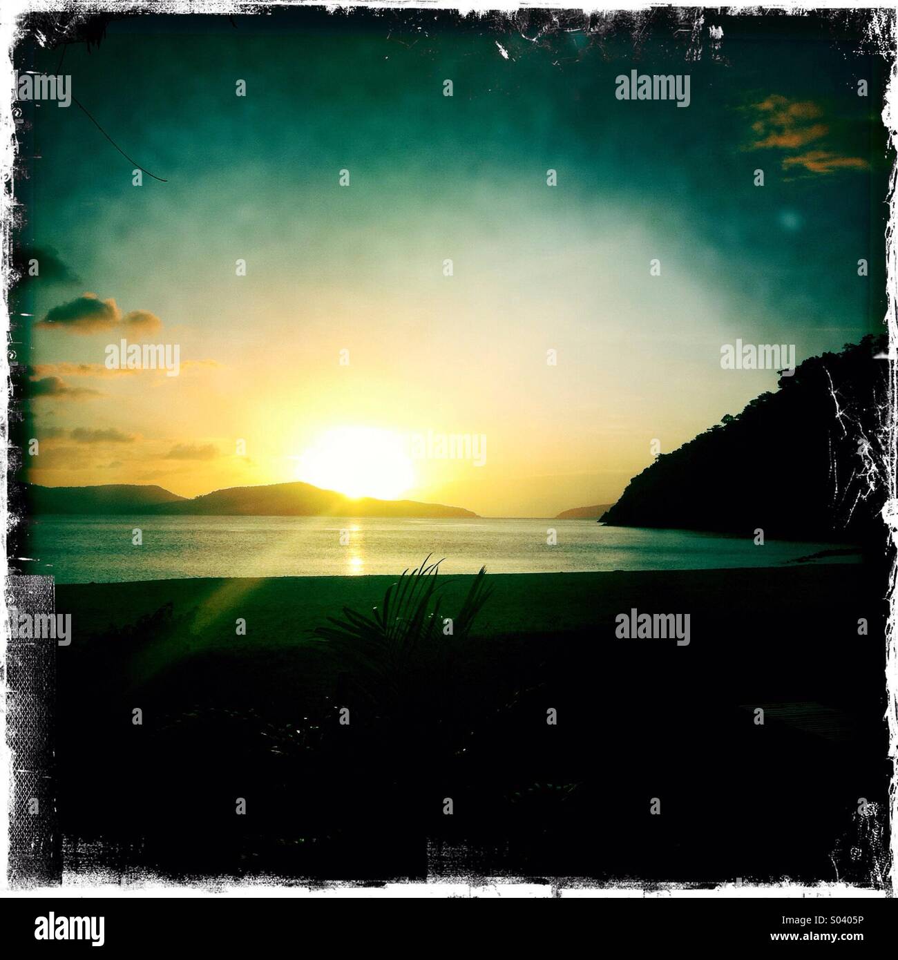 Sunset on remote beach smartphone stock photos and images - Alamy