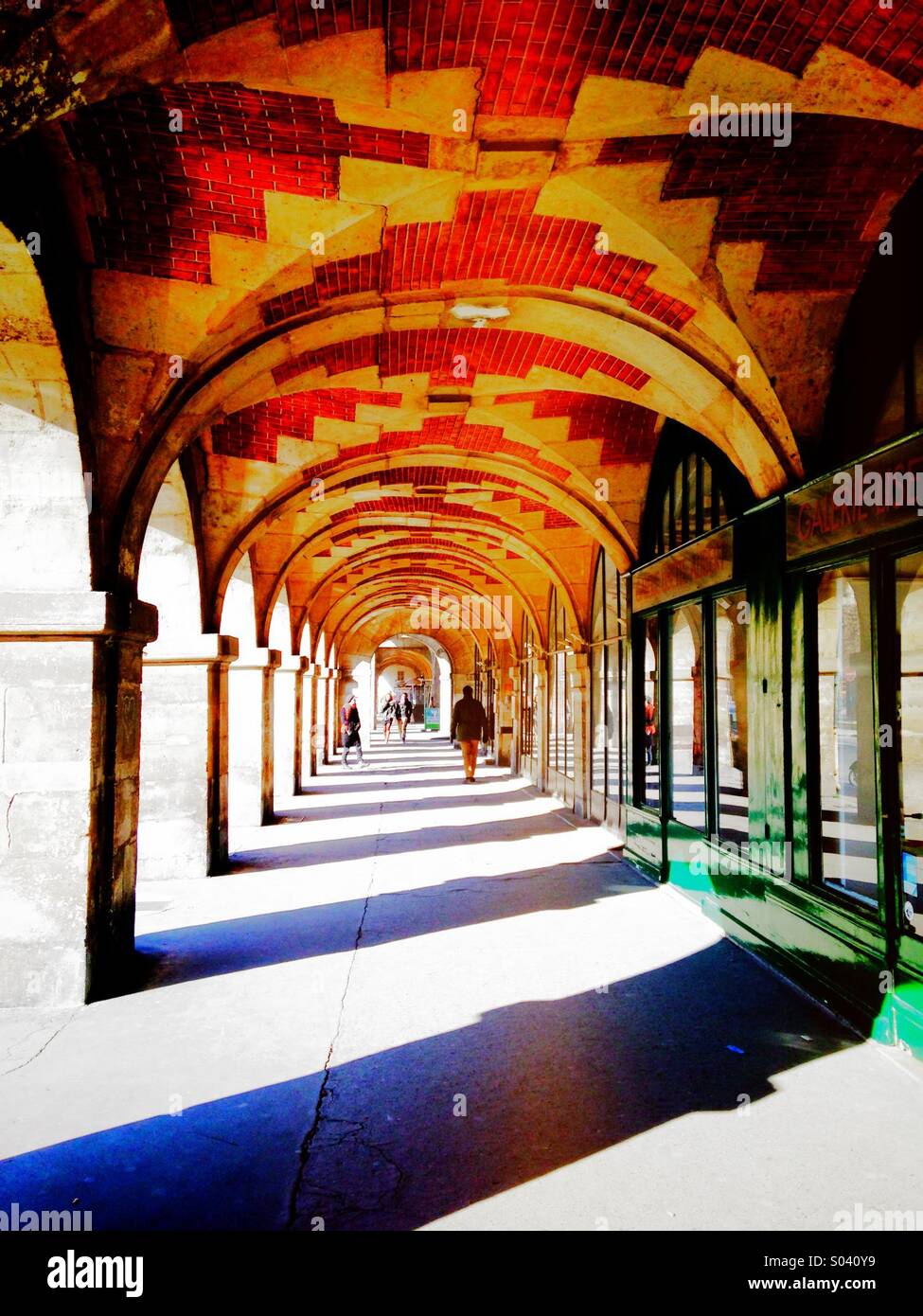 Colorful arcade with pillars in France Stock Photo - Alamy