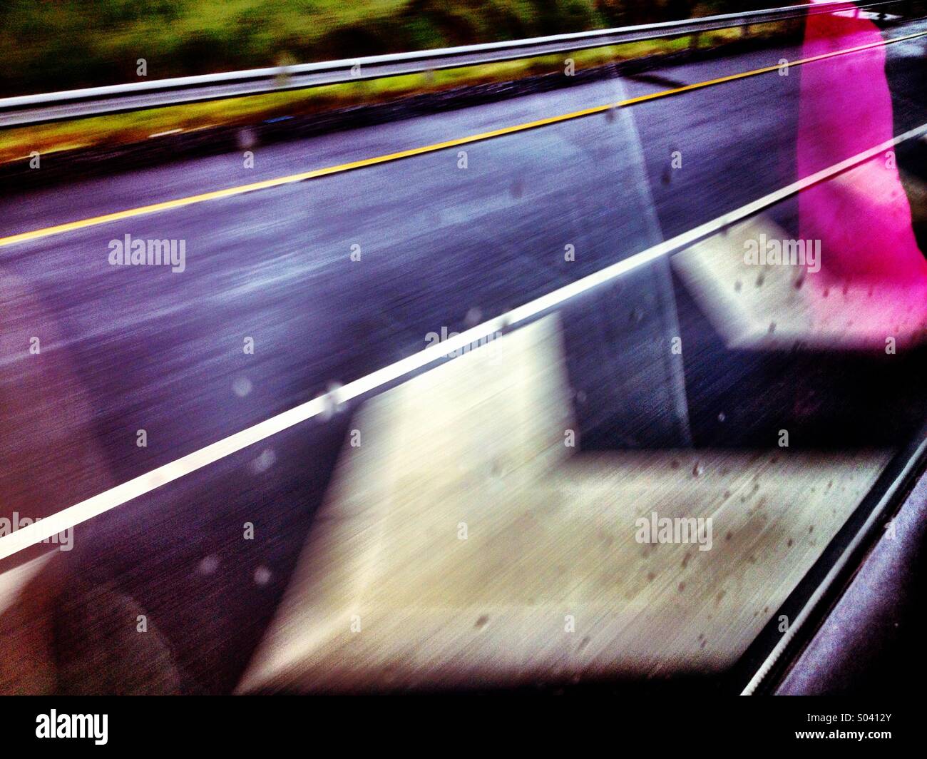 Wet motorway from bus window Stock Photo - Alamy