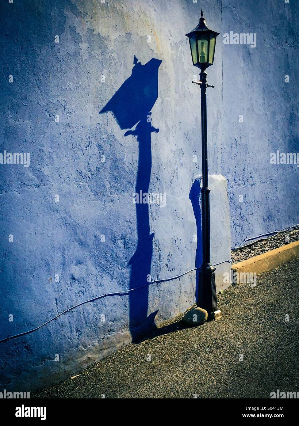 Me and my blue shadow Stock Photo - Alamy