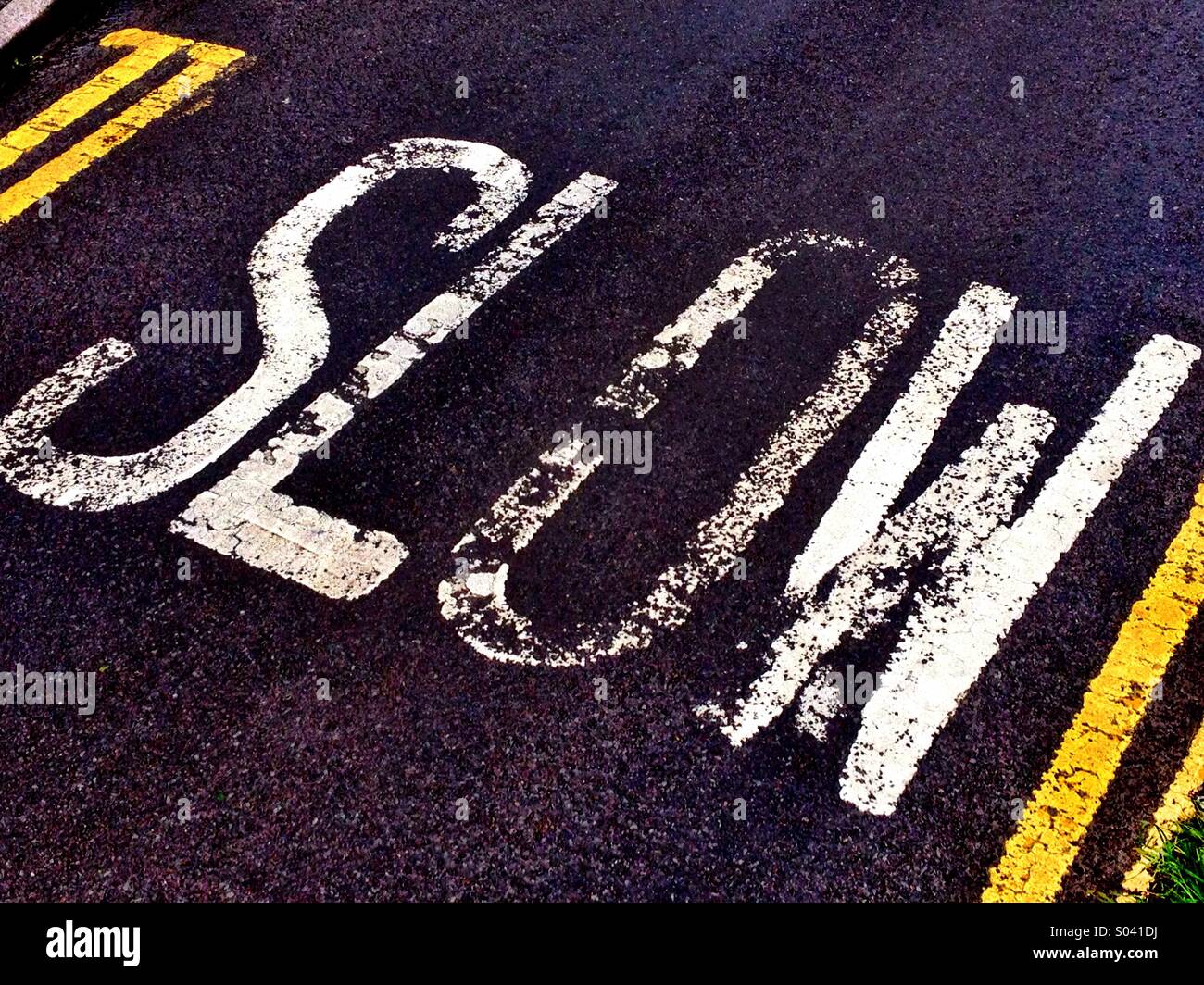 Slow road signage Stock Photo - Alamy