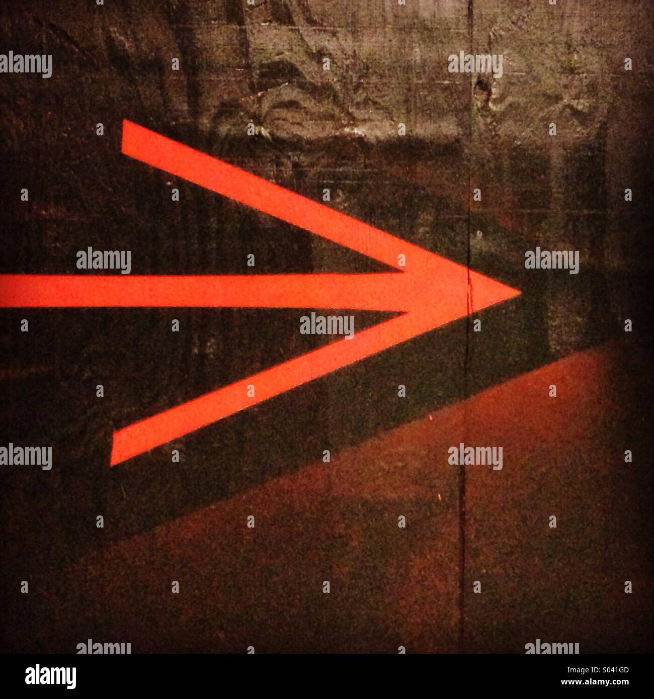 Red arrow at wall hi-res stock photography and images - Alamy