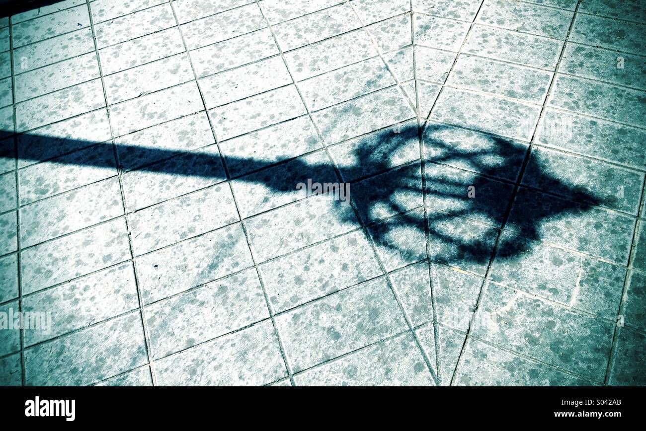 Shadow of a lamp post Stock Photo - Alamy