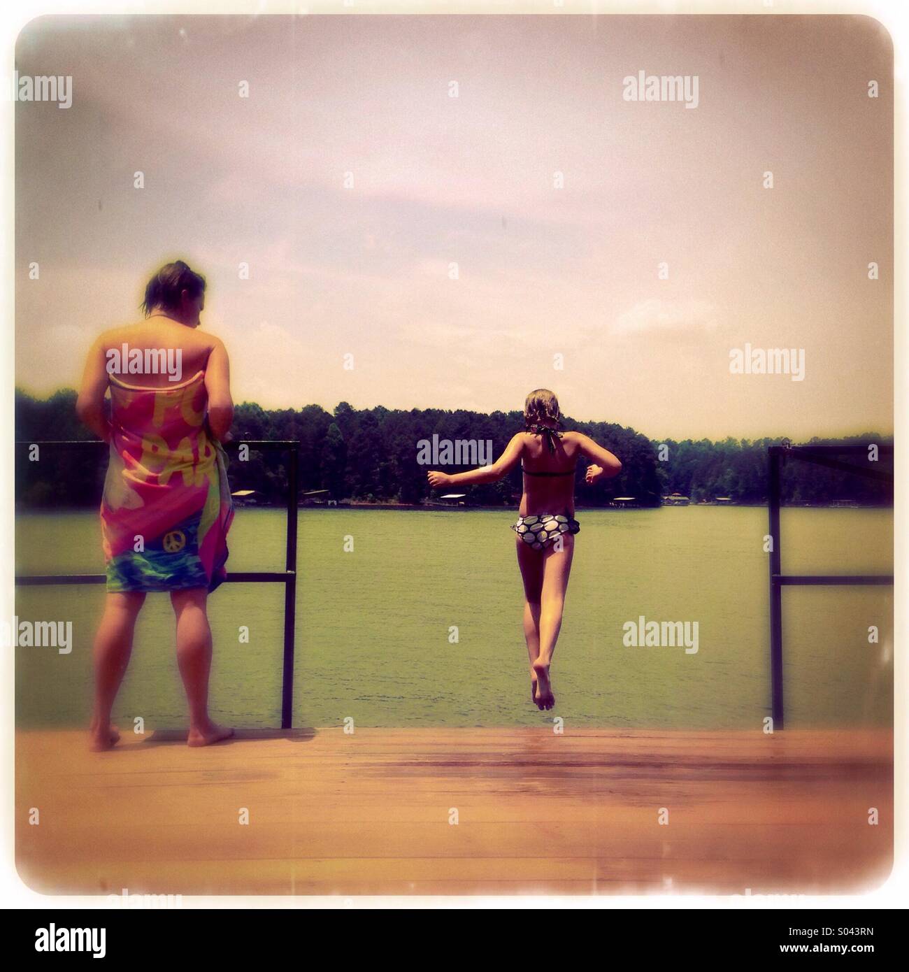 Jumping Into Lake Girl High Resolution Stock Photography and Images - Alamy