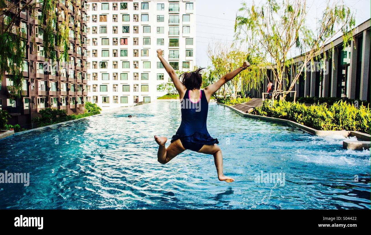 Lady jumping in water hi-res stock photography and images - Alamy