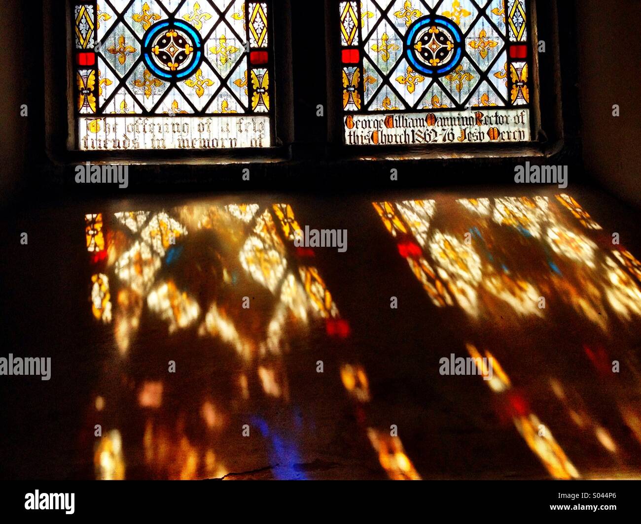 Stained glass reflection Stock Photo - Alamy