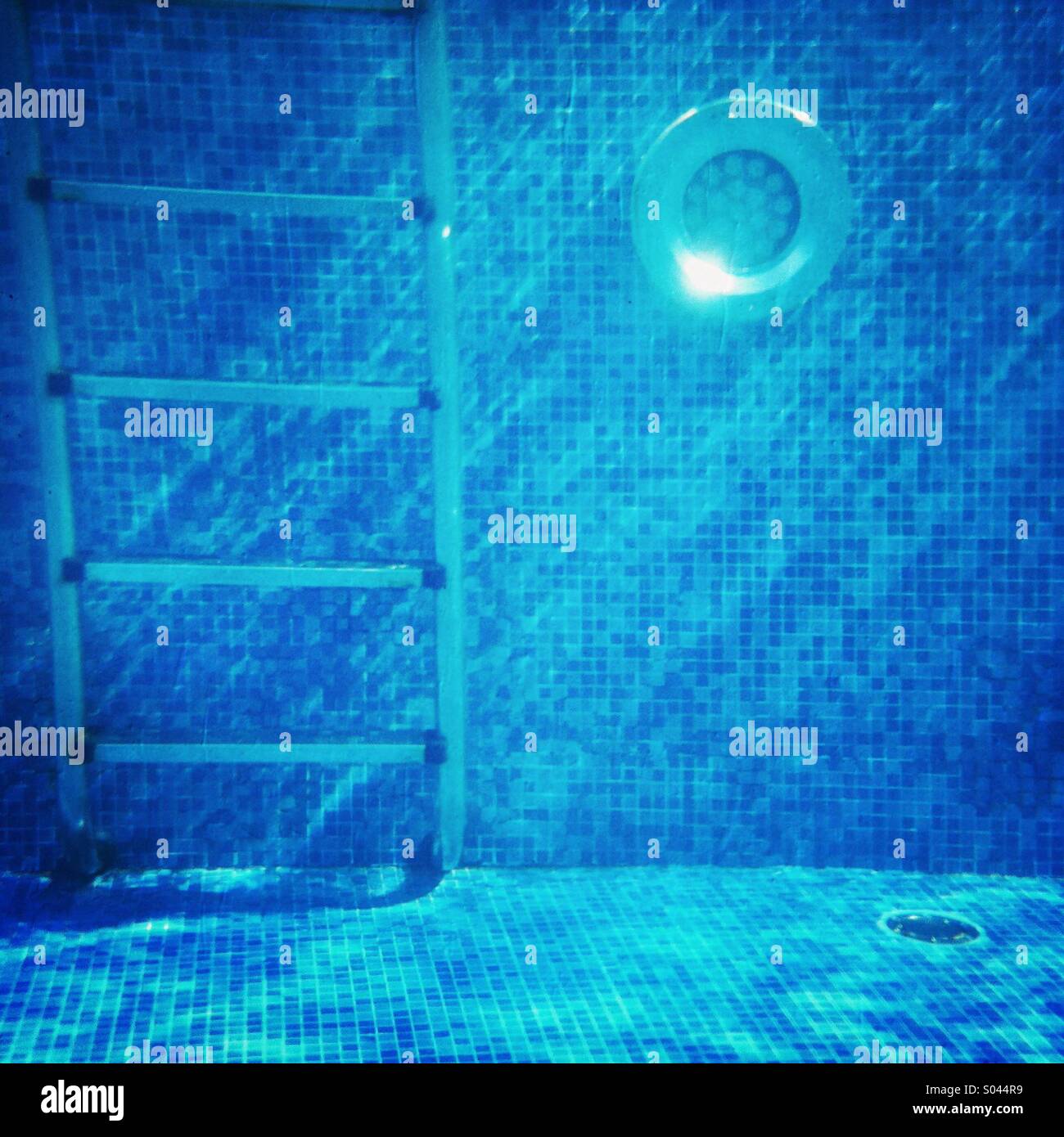 A pool ladder from underwater Stock Photo - Alamy