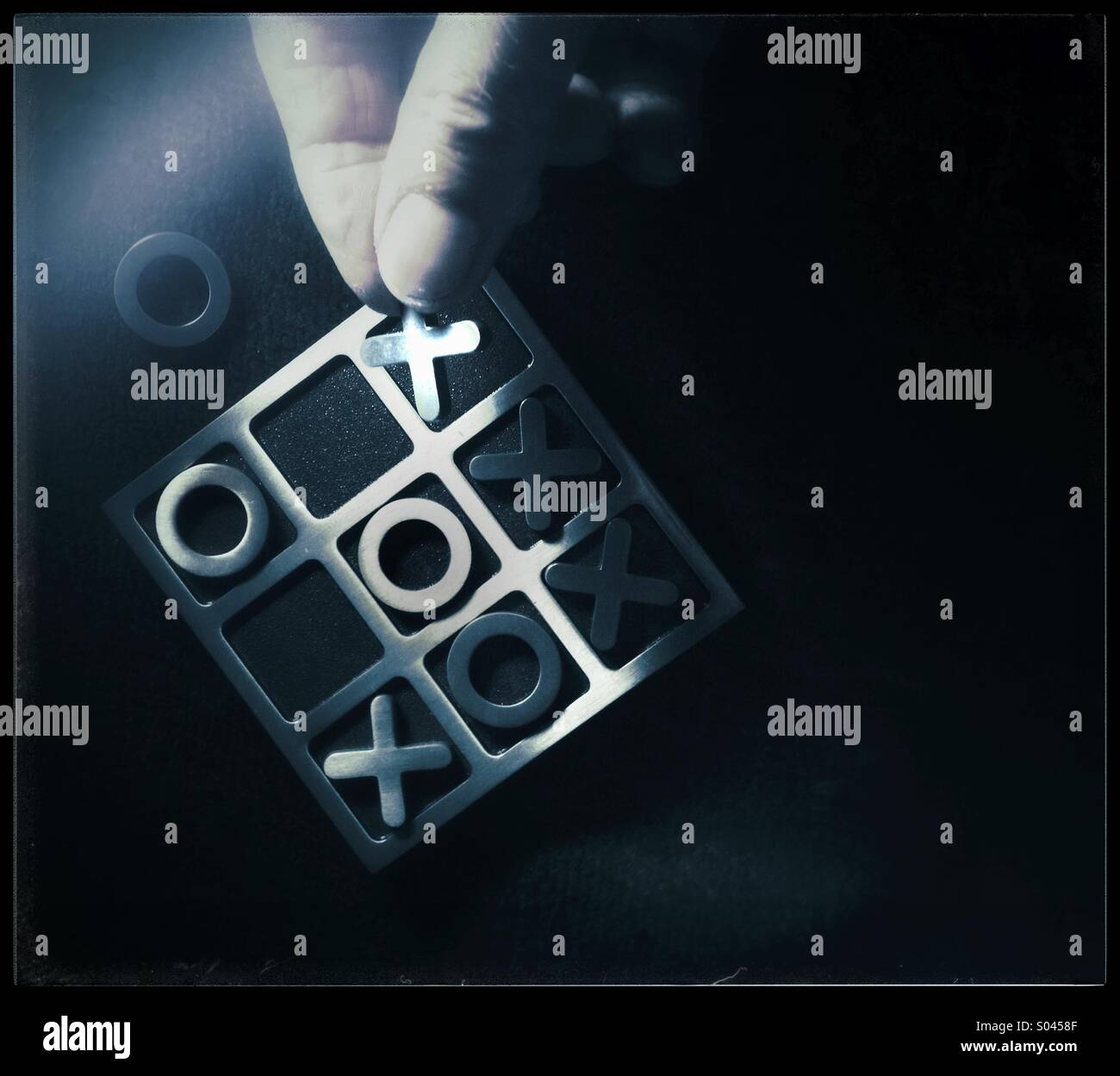 Tic tac toe noughts crosses hi-res stock photography and images - Alamy
