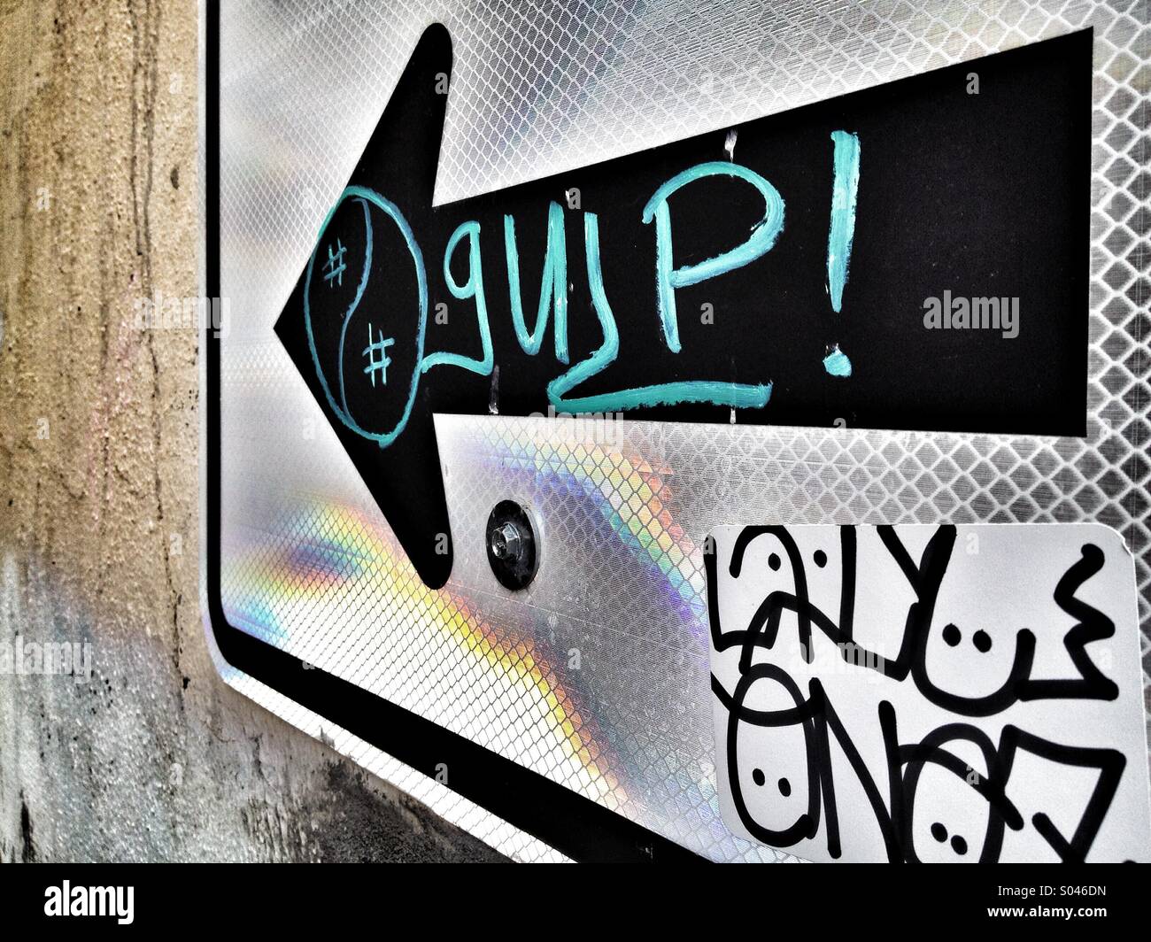 A graffiti laden one way sign in Knoxville, Tennessee Stock Photo - Alamy
