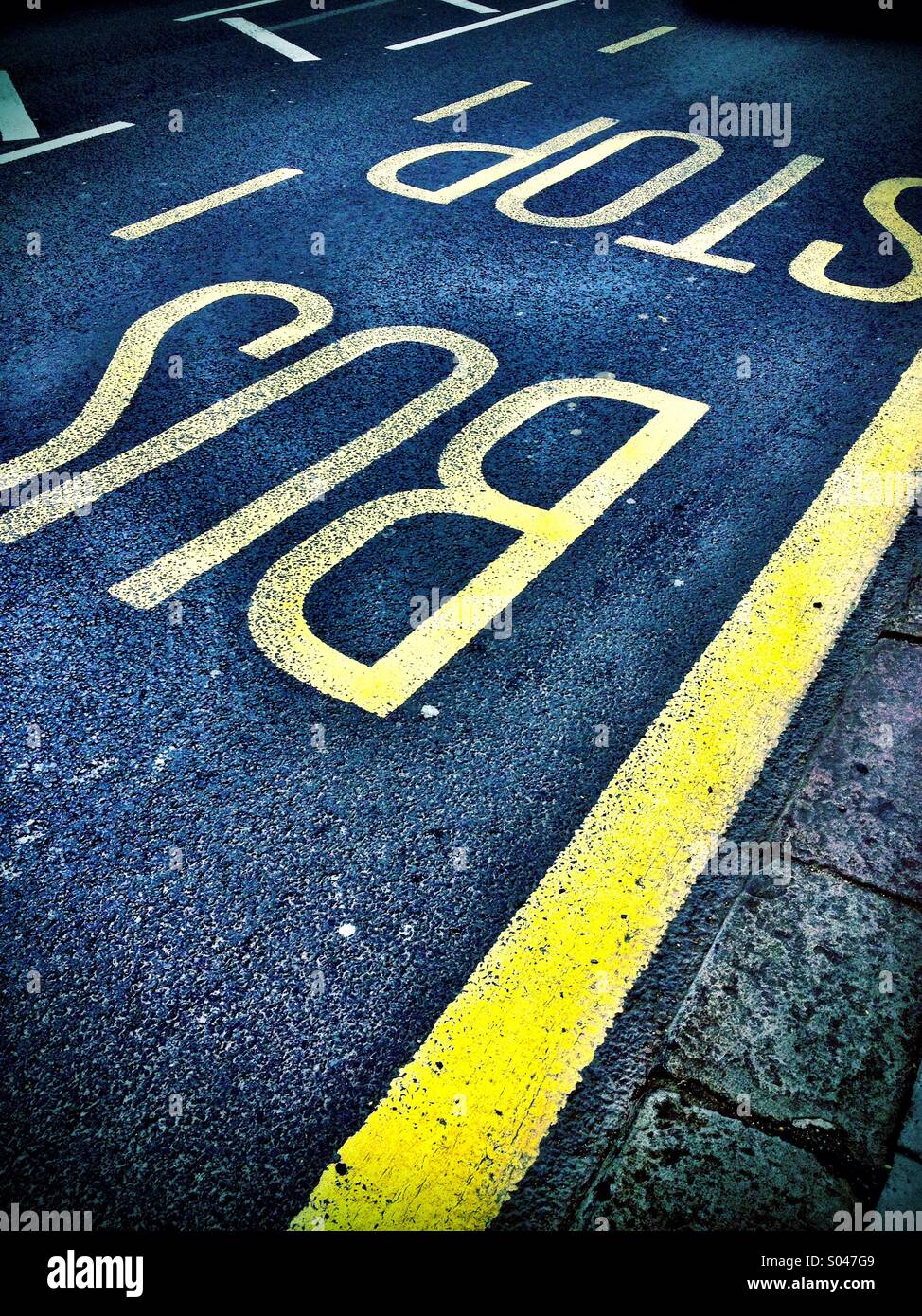 Bus stop yellow paint hi-res stock photography and images - Alamy