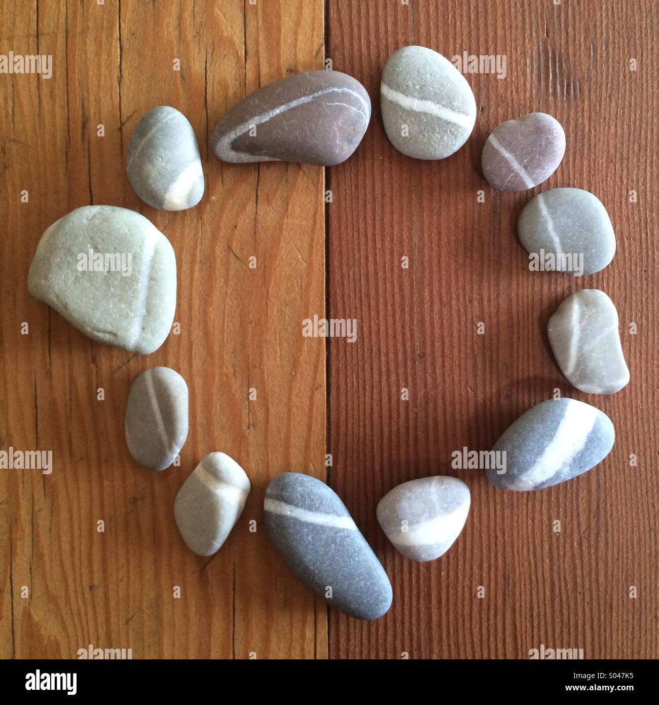 Circle of pebbles Stock Photo - Alamy