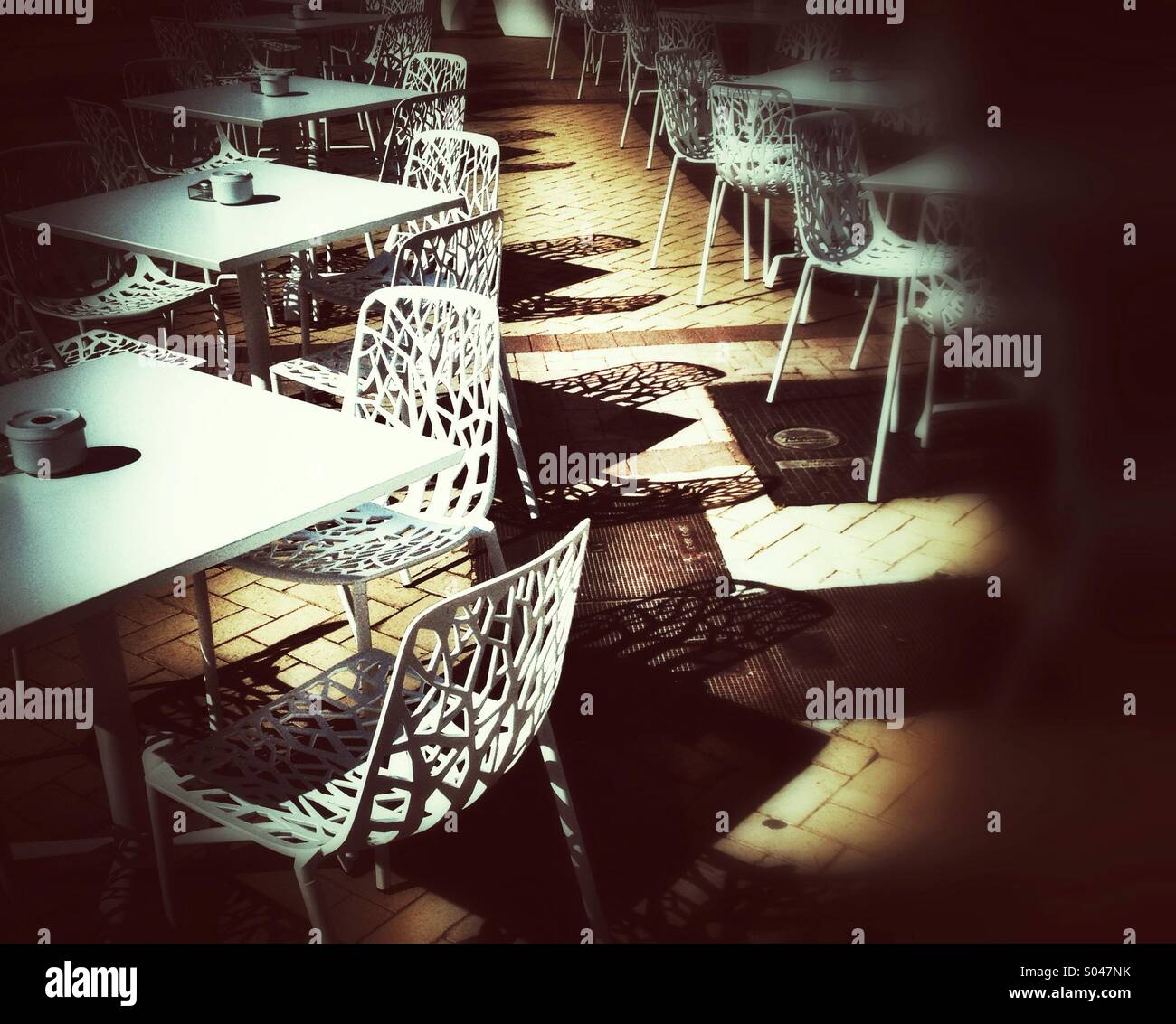 Pavement chairs hi-res stock photography and images - Alamy