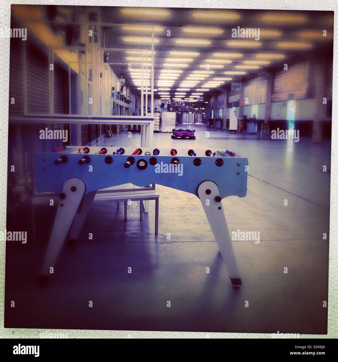 Table football inside the stadium Stock Photo - Alamy