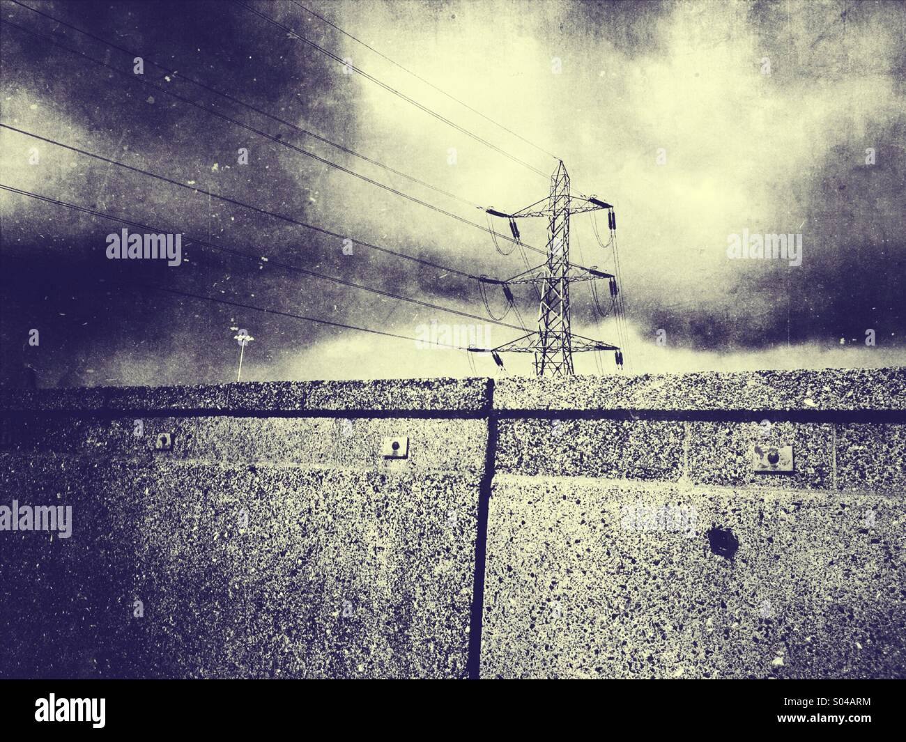 Electricity pylon and concrete structure Stock Photo - Alamy