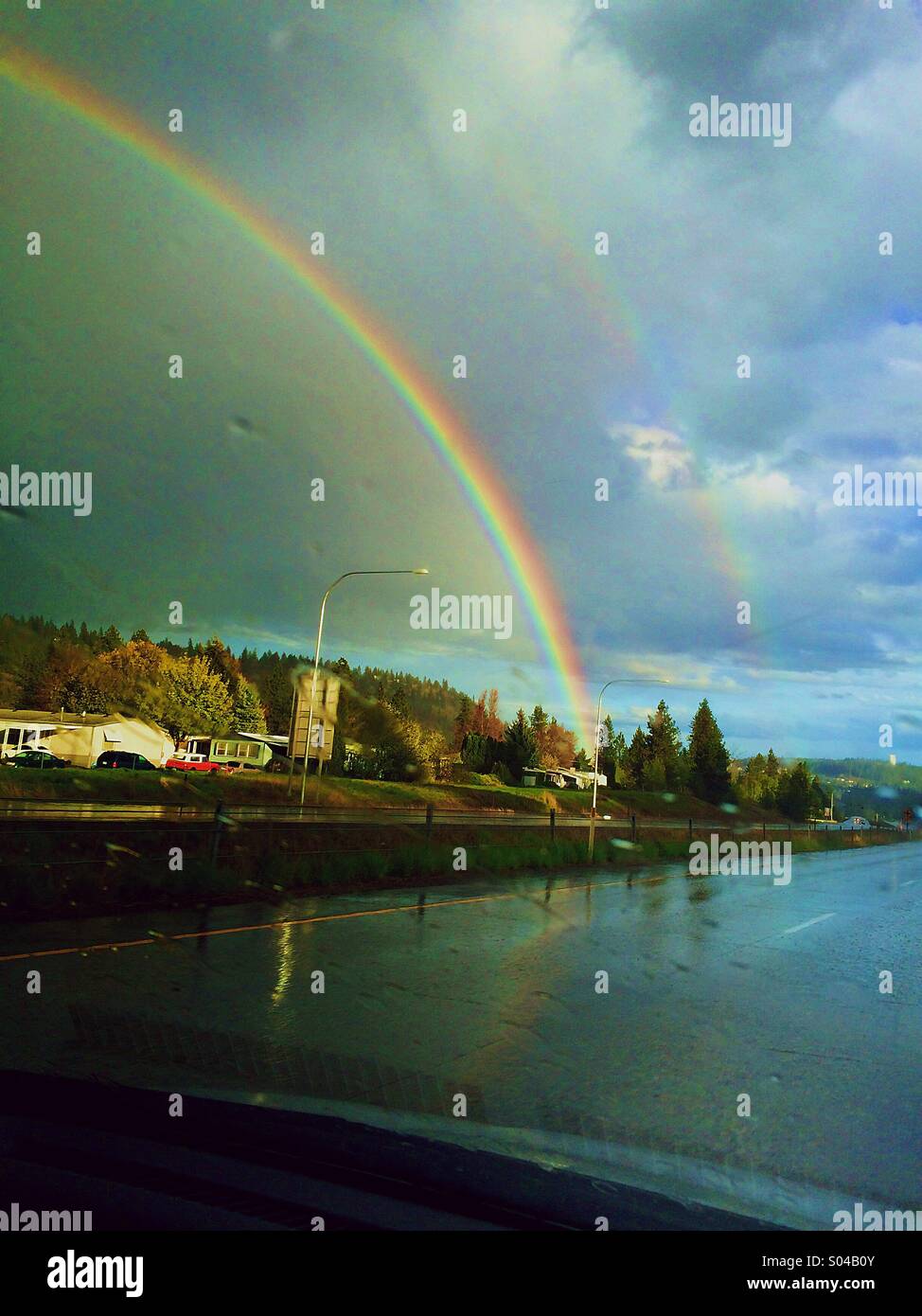 Rainbow rain and sun hi-res stock photography and images - Alamy