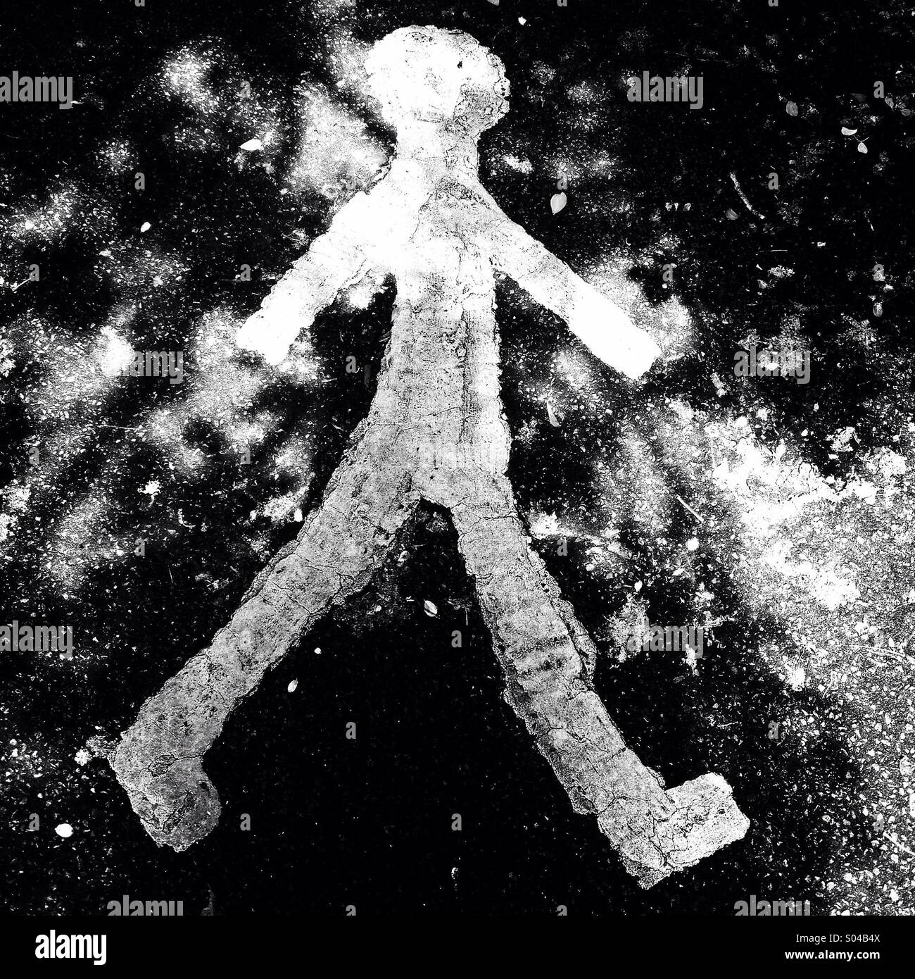 Symbol of person walking in white paint on tarmac under tree shade ...