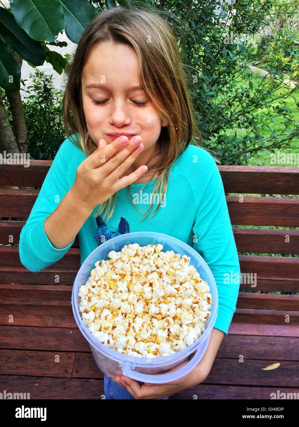 Girl eating food hi-res stock photography and images - Alamy