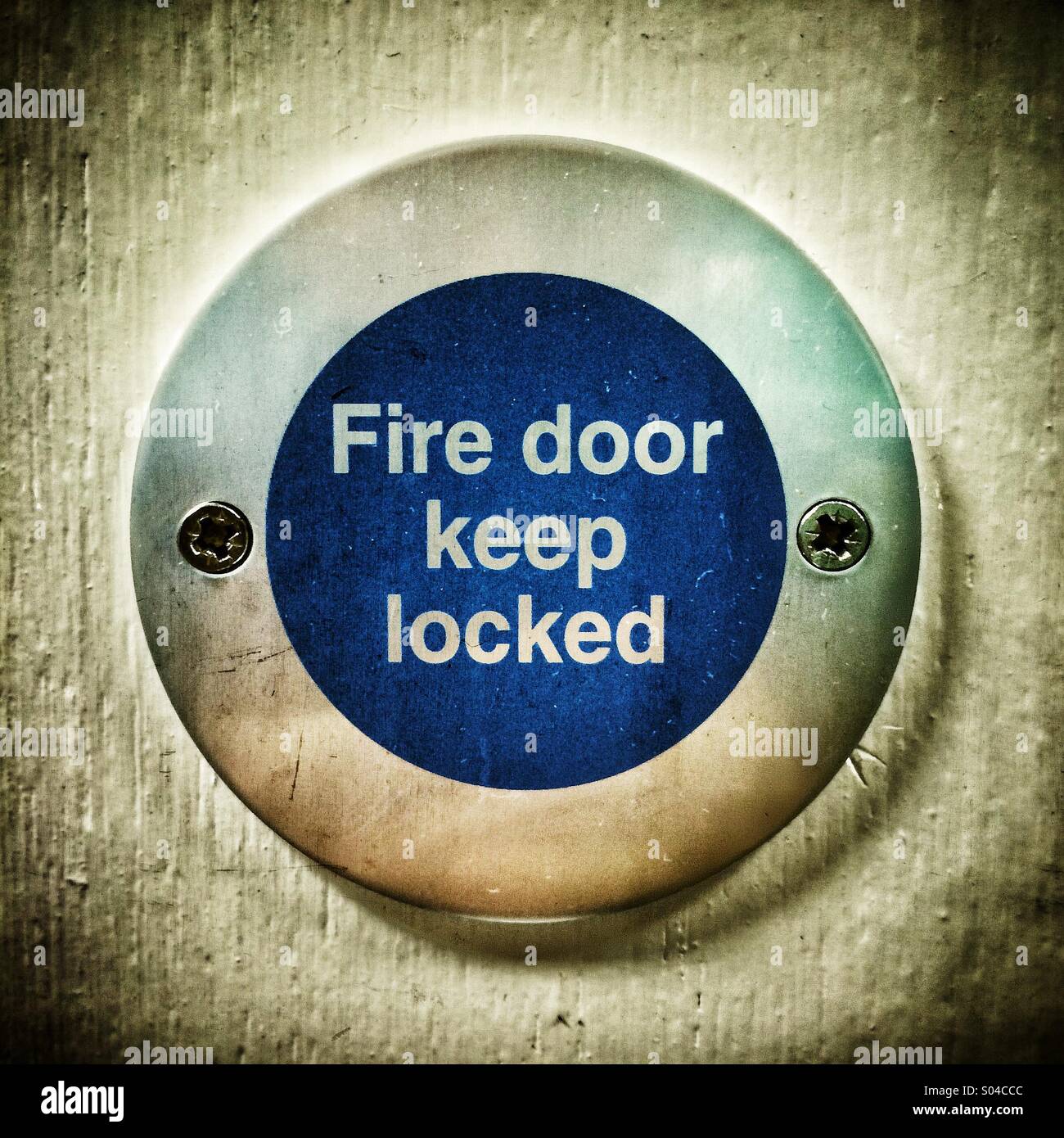 Fire door keep locked sign Stock Photo - Alamy