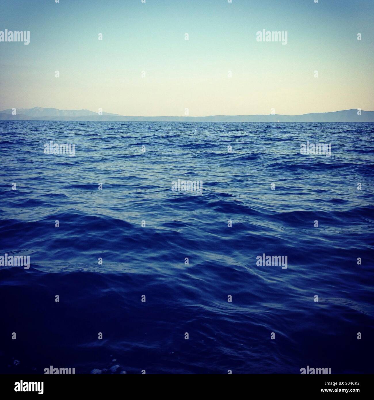Blue sea background Stock Photo - Alamy