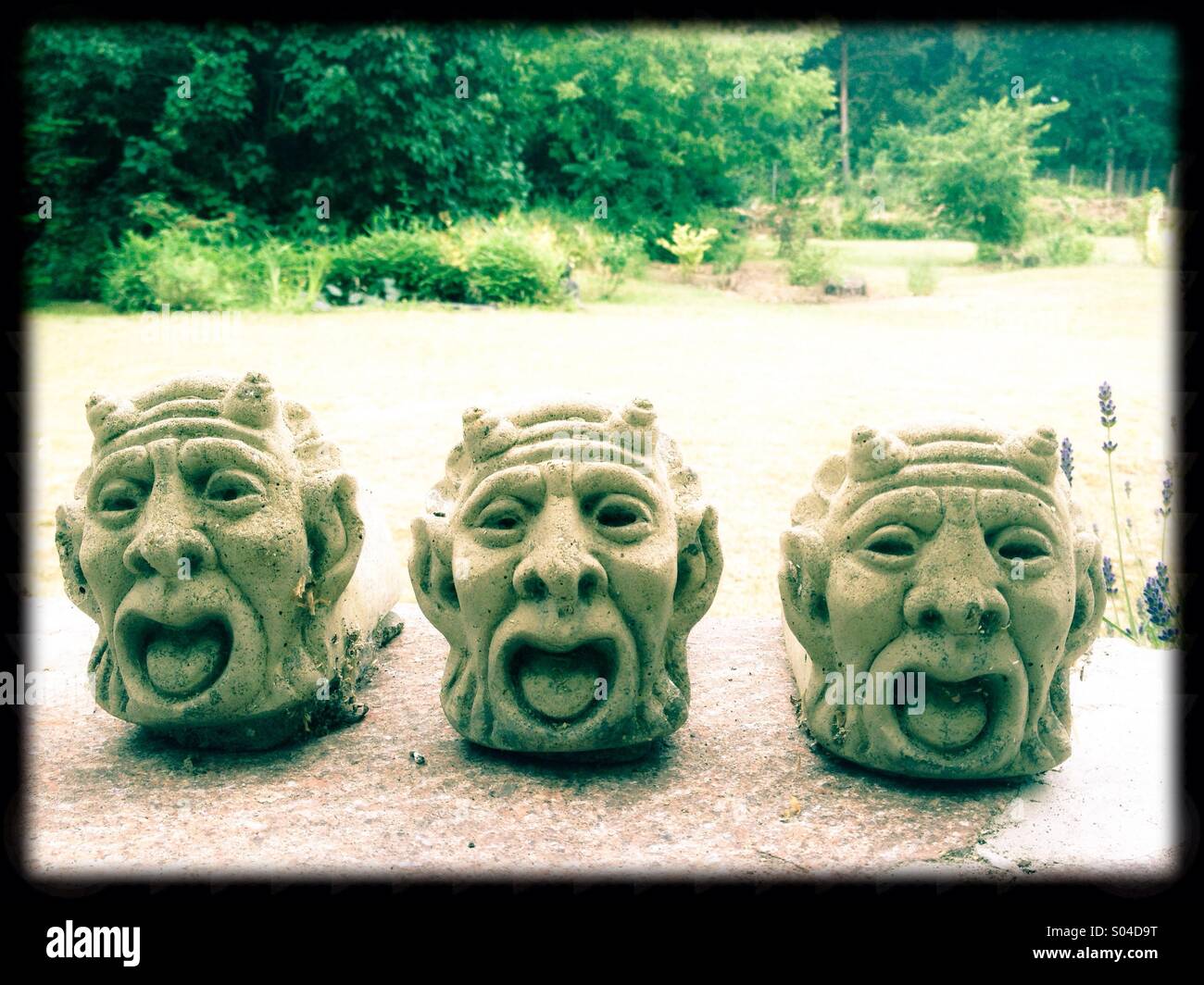 Three little devils Stock Photo - Alamy