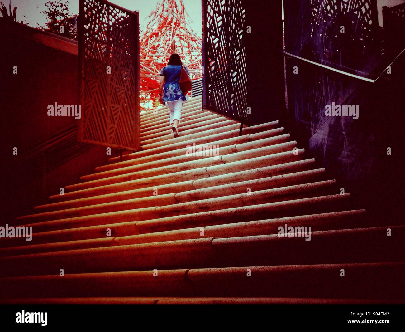 Woman and stairs climbing hi-res stock photography and images - Alamy