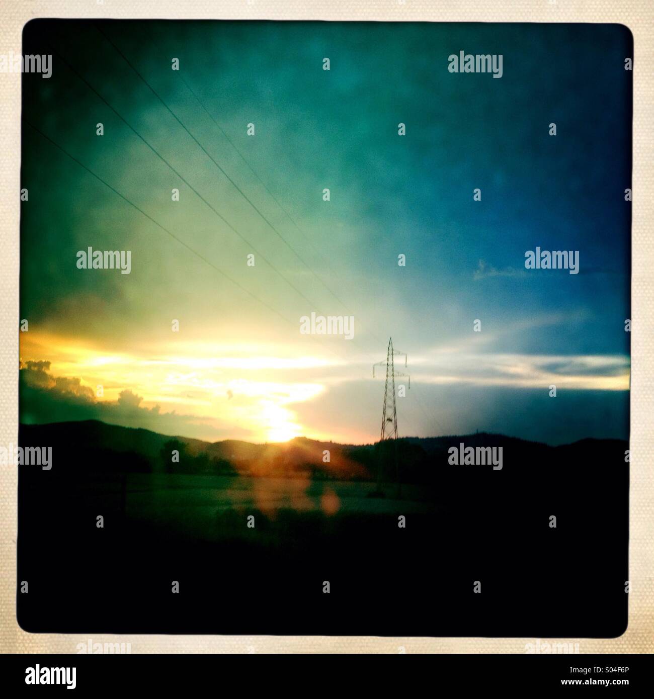 Sunset with electrical pole Stock Photo - Alamy