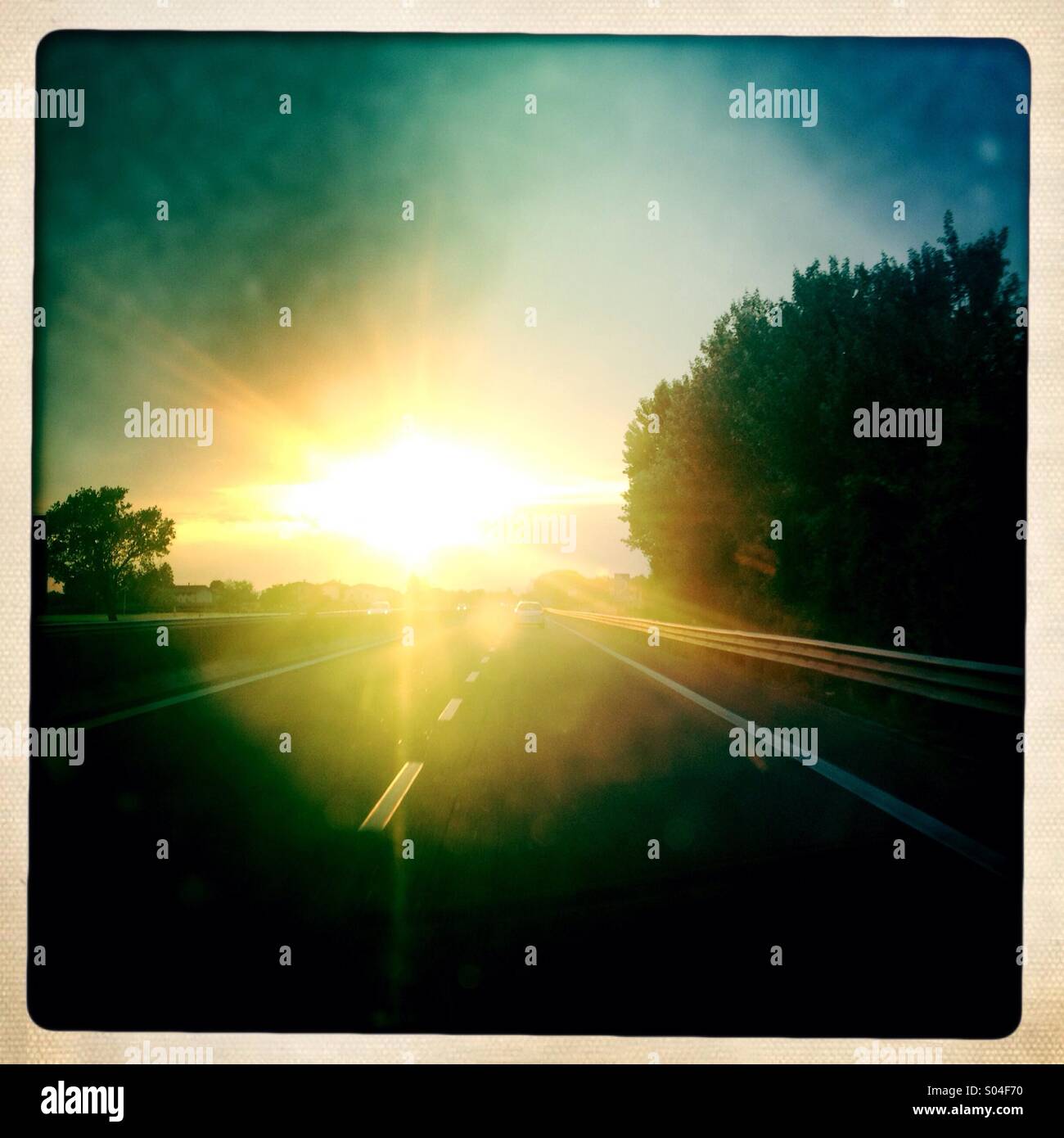 Driving into sunset hi-res stock photography and images - Alamy