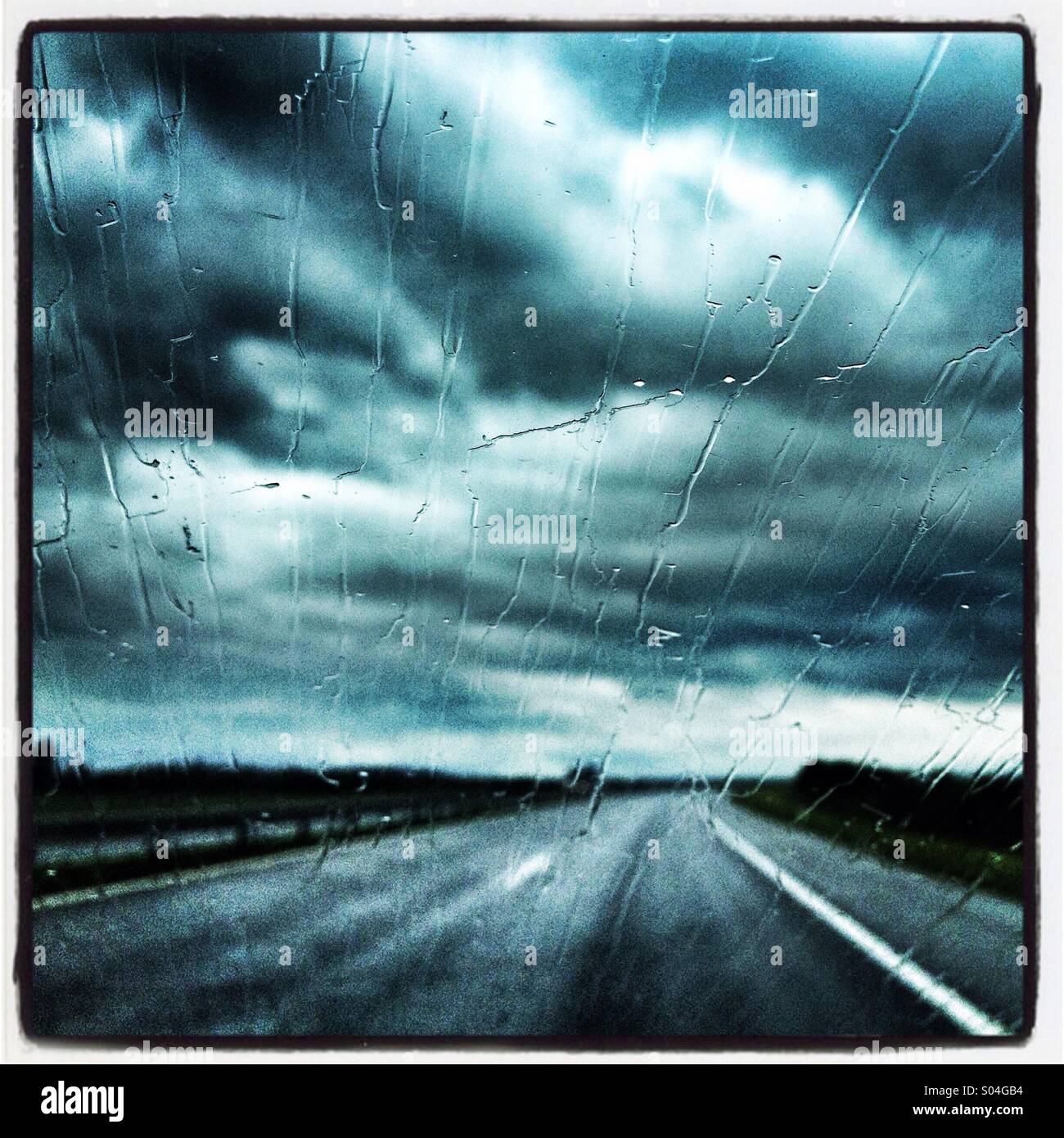 Rain on highway Stock Photo - Alamy