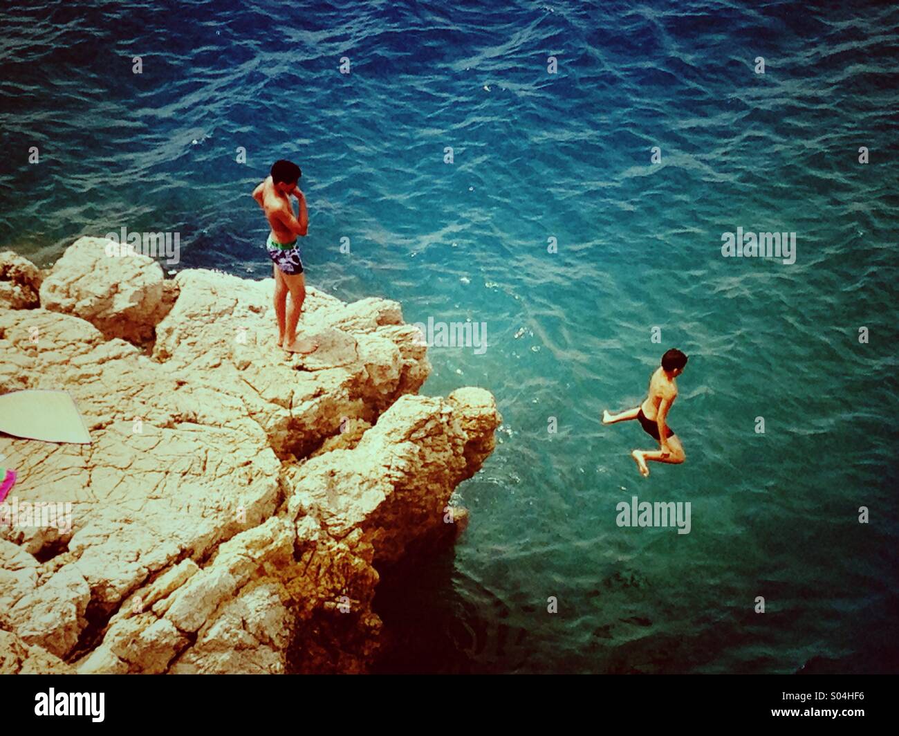 Two boys swimming hi-res stock photography and images - Alamy