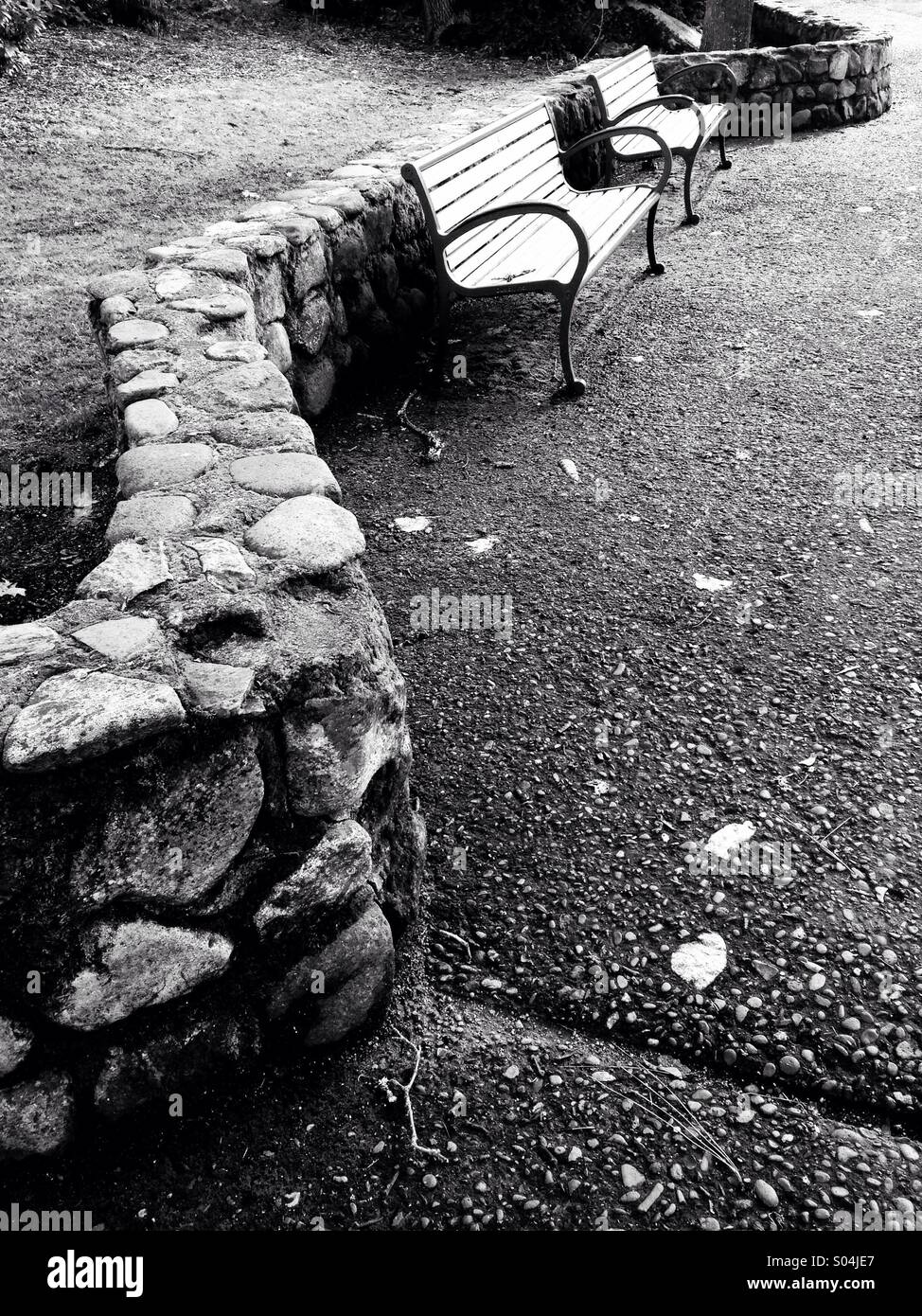 Benches stone wall hi-res stock photography and images - Alamy