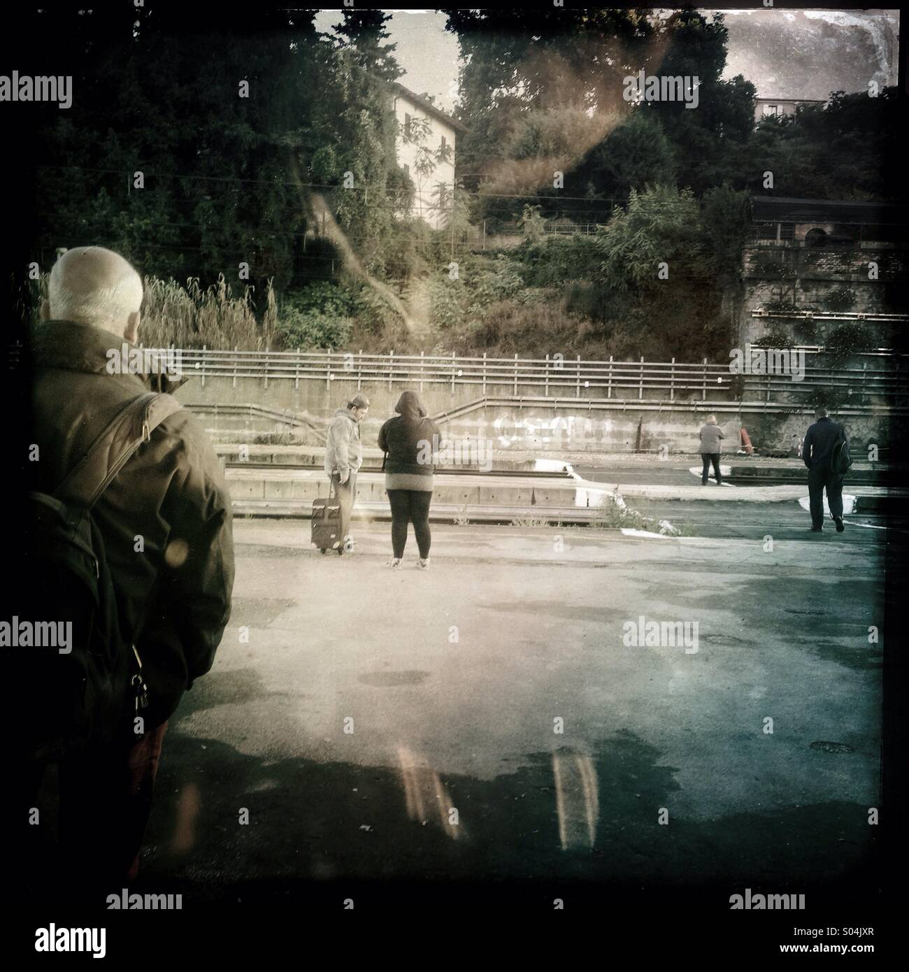 Waiting for a train in a little station Stock Photo - Alamy