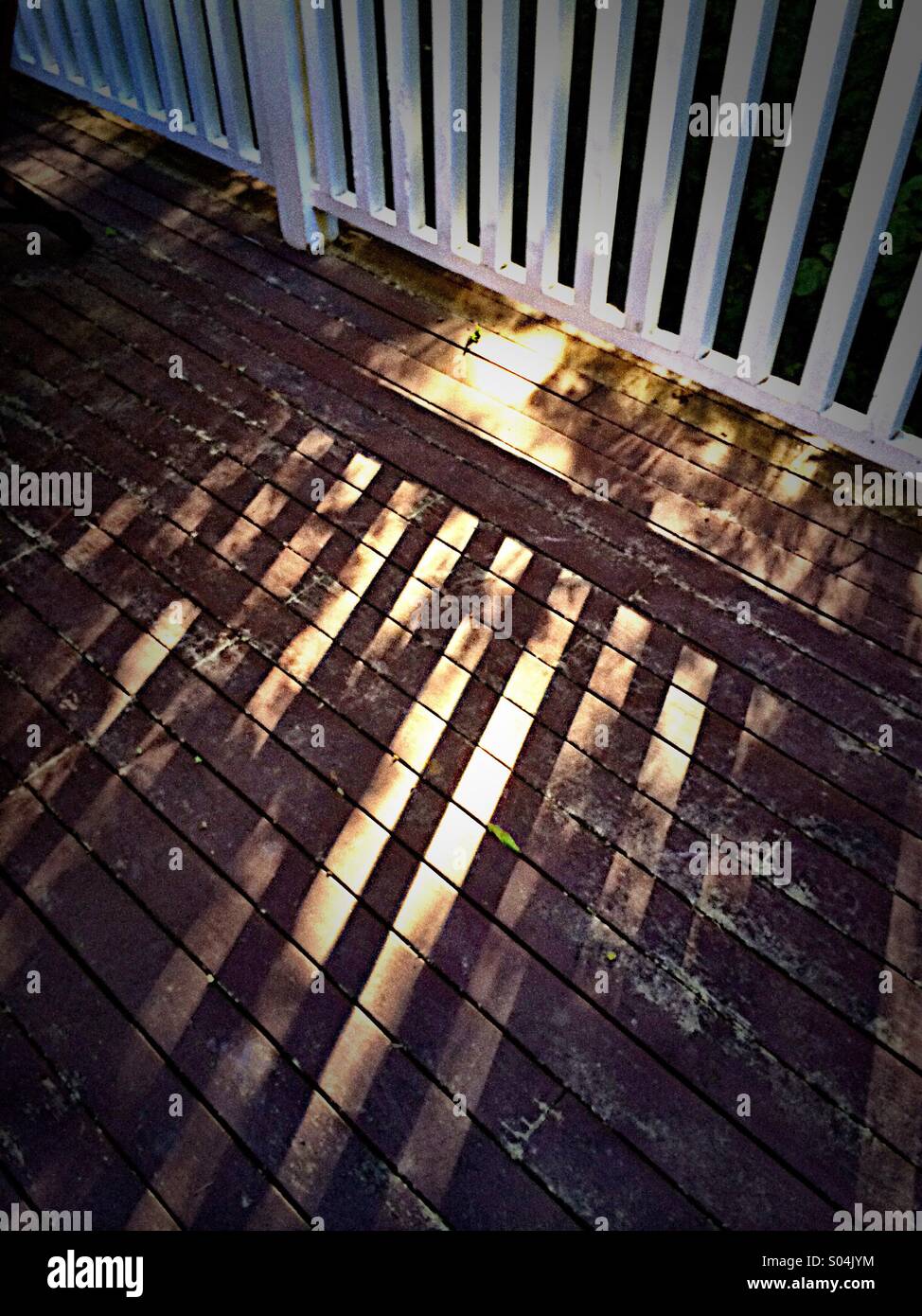 Afternoon sunlight on a porch with shadows Stock Photo - Alamy