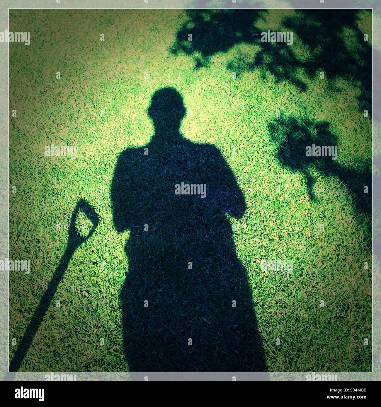 Man shadow grass hi-res stock photography and images - Alamy