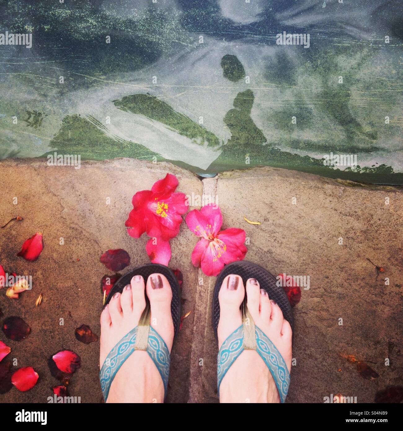 Feet flip flop hi-res stock photography and images - Alamy