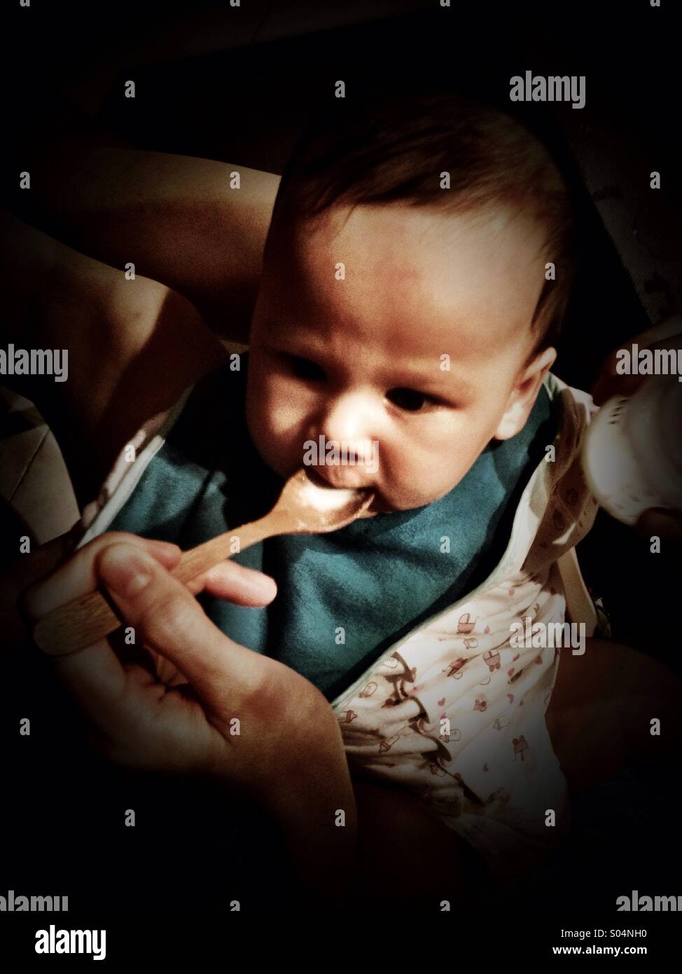 Spoon feed hi-res stock photography and images - Alamy