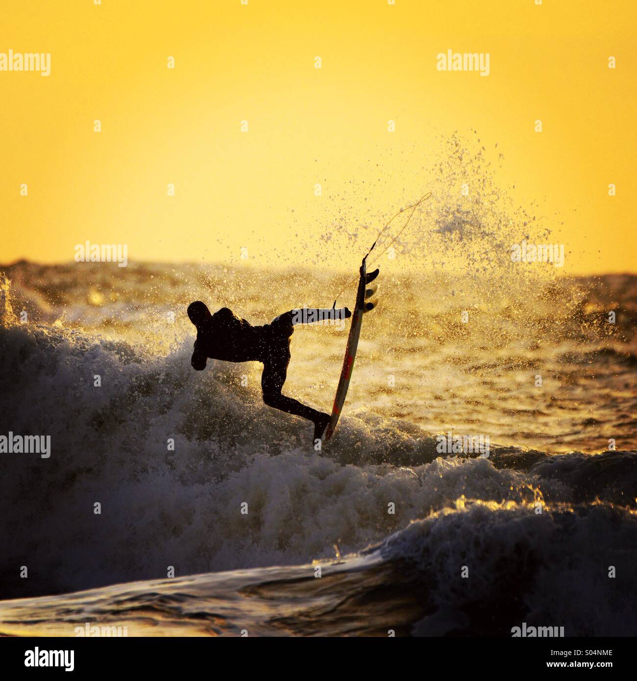 Sunset surfer hi-res stock photography and images - Alamy