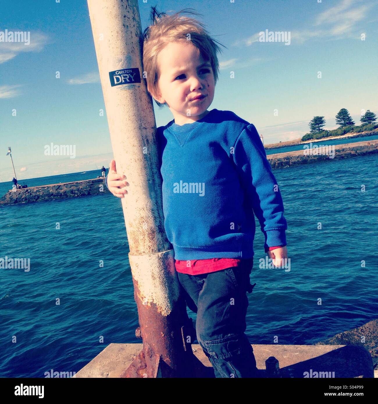 Child standing on pier hi-res stock photography and images - Alamy
