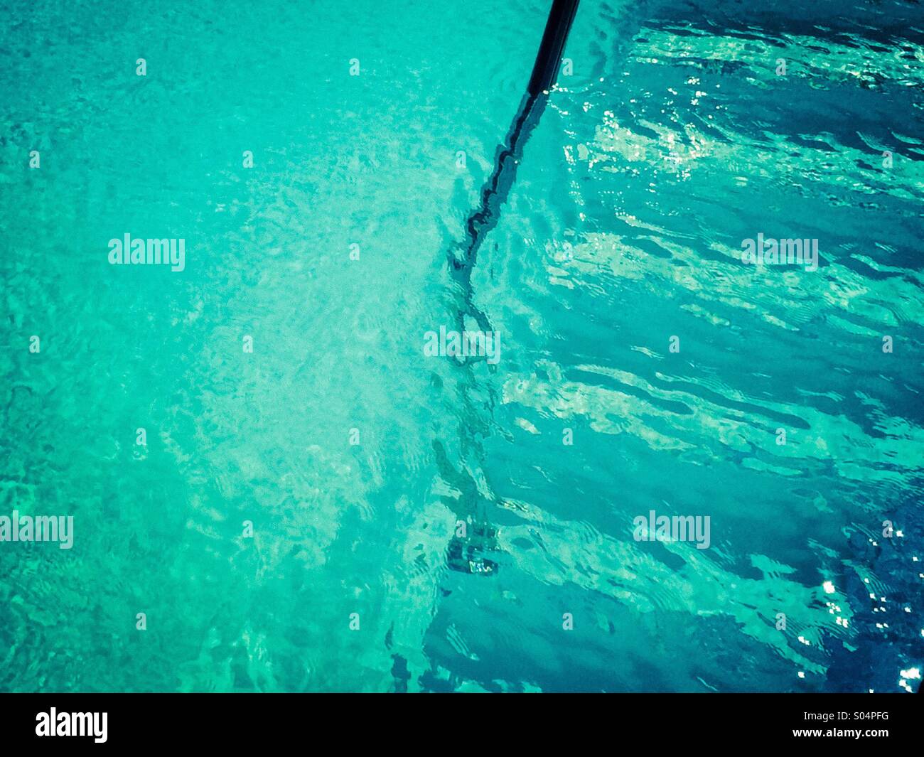 Steps down blue swimming pool hi-res stock photography and images - Alamy
