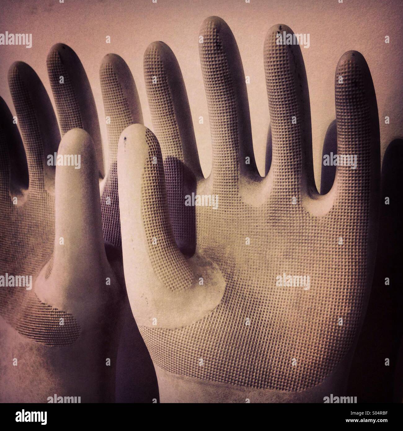 Pair of ceramic hands used for glove forms Stock Photo - Alamy