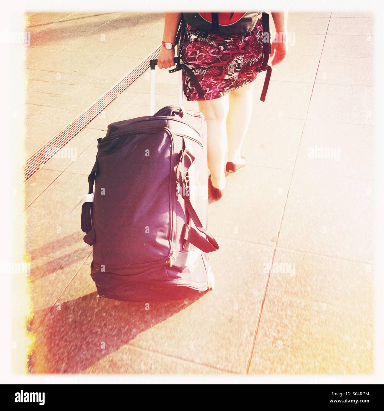 Woman suitcase trolley hi-res stock photography and images - Alamy