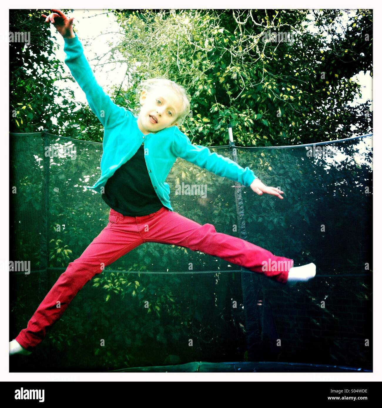 Child trampoline jump jumping hi-res stock photography and images - Alamy