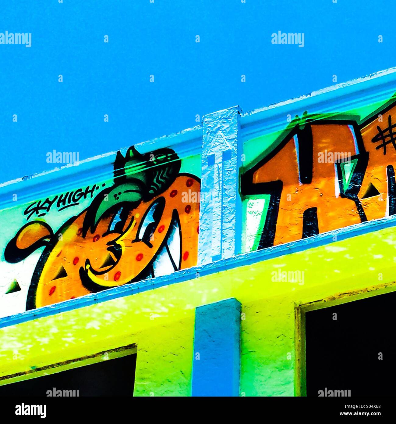 Vibrant graffiti decorates facade of old historic Miami building Stock ...