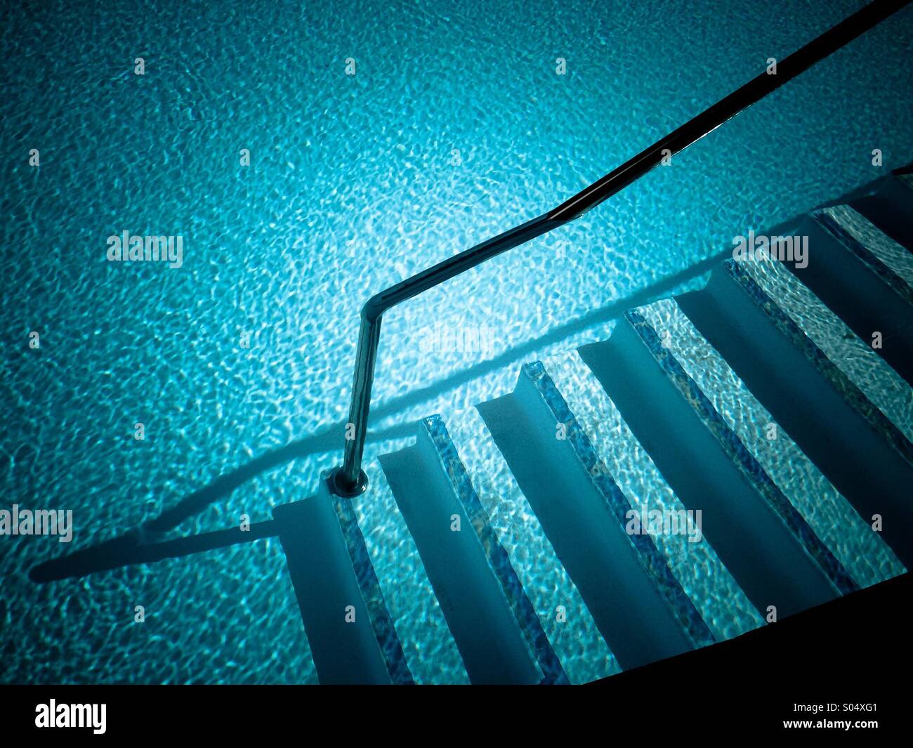 Steps down to swimming pool hi-res stock photography and images - Alamy
